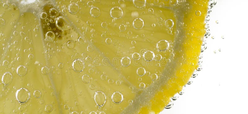 Yellow Lemon with Bubbles on White Background Stock Photo - Image of ...