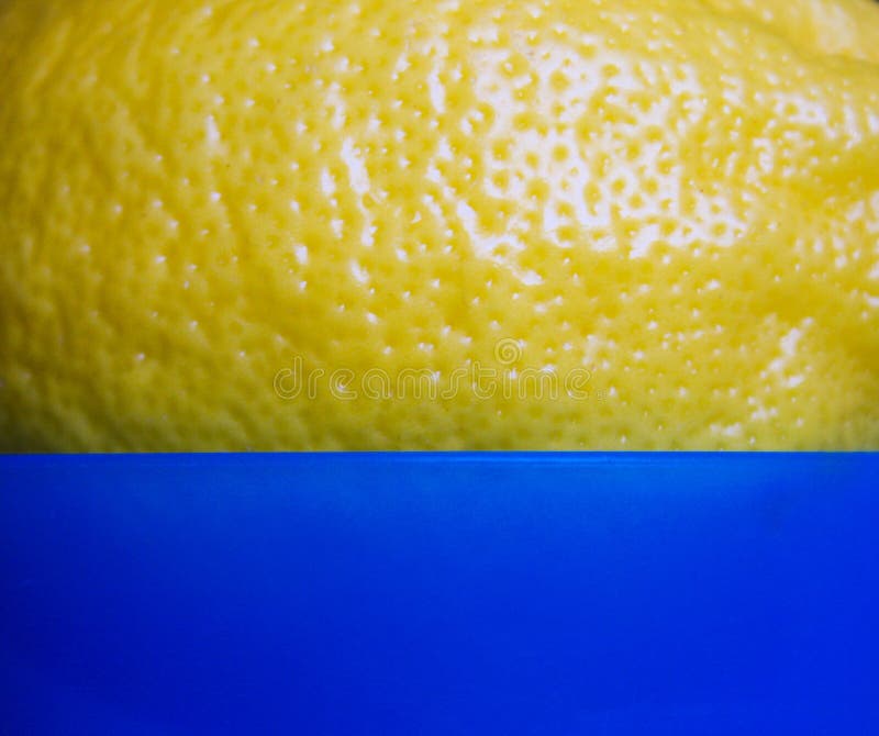 Yellow Lemon Texture on a Blue Background Stock Image - Image of ...