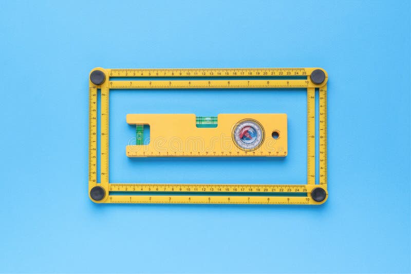 Yellow Level and Creative Ruler on a Blue Background. Minimal Concept ...