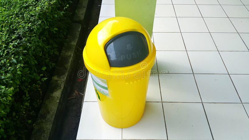 Yellow Lid Bin on the White Floor Stock Image - Image of collect, white ...