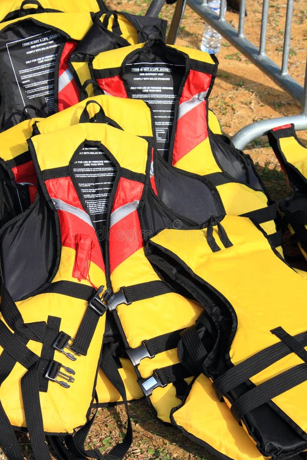 Yellow Life Jacket stock image. Image of isolated, wear - 18022183