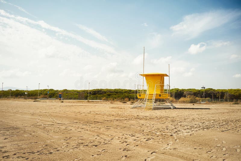 Yellow Lifeguard Post on an Empty Beach Stock Image - Image of post ...