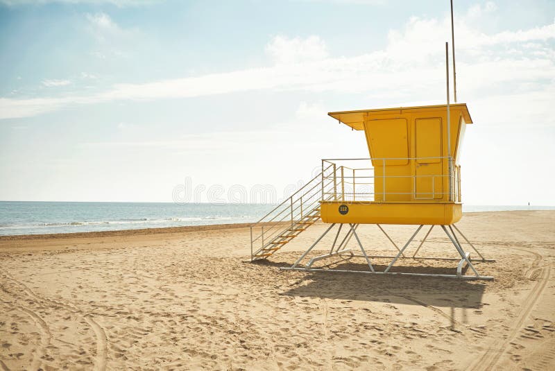 Yellow Lifeguard Post on an Empty Beach Stock Photo - Image of safe ...