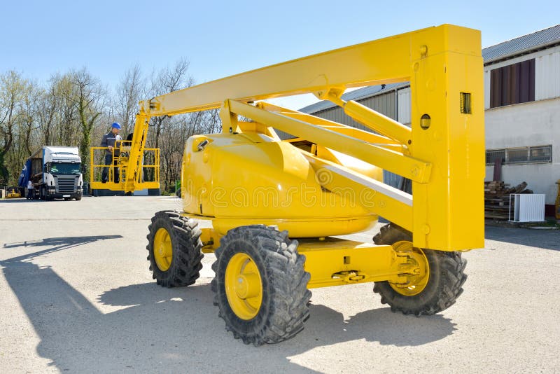 Yellow Lift Loader Platform Stock Photo - Image of lift, carriage ...