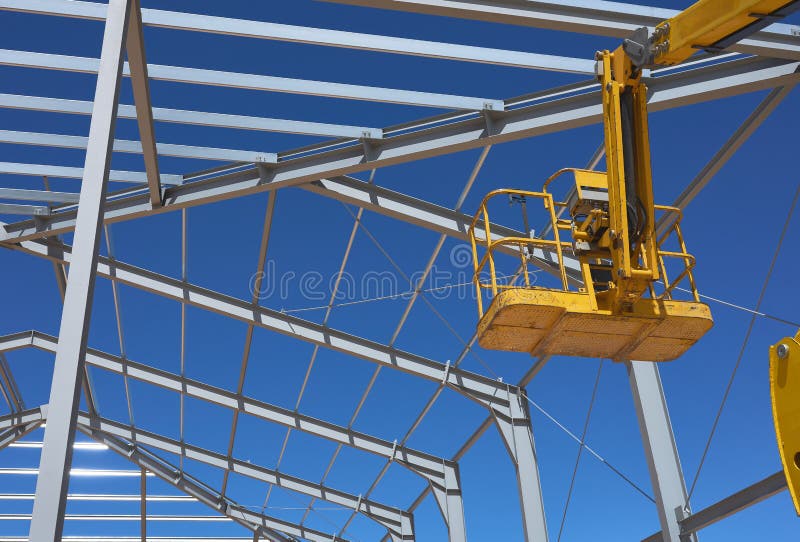 Yellow Lifting Platform for Construction in the Construction of Stock ...