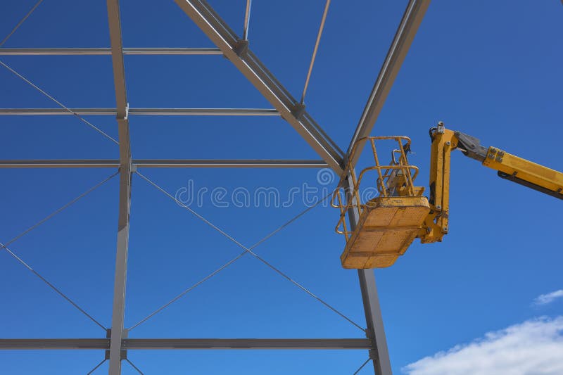 Yellow Lifting Platform for Construction in the Construction of Stock ...