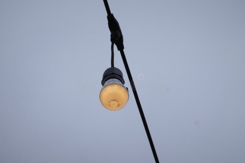 Yellow light bulb stock image. Image of furniture, cloud - 261995681