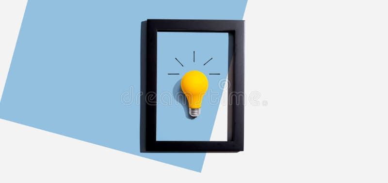 Yellow Light Bulb Inside a Frame - Inspiration, Creativity Themes Stock ...
