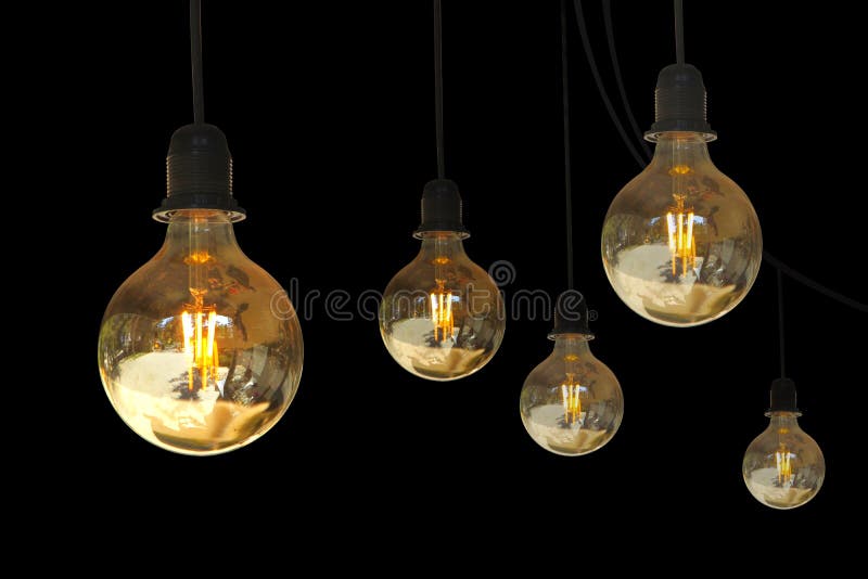Yellow Light Bulbs Isolated on Black Background Stock Photo - Image of ...