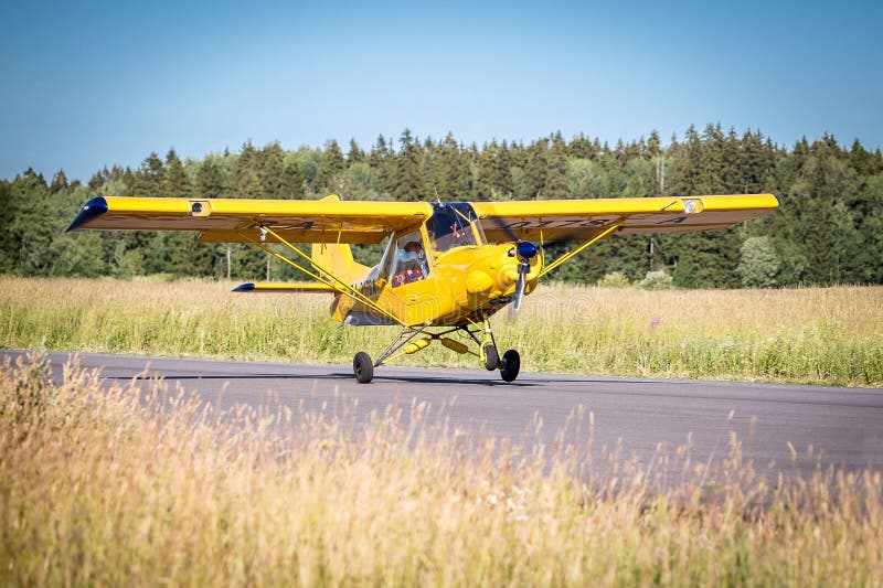 Yellow Light Plane Accelerate for Takeoff Stock Image - Image of wing ...