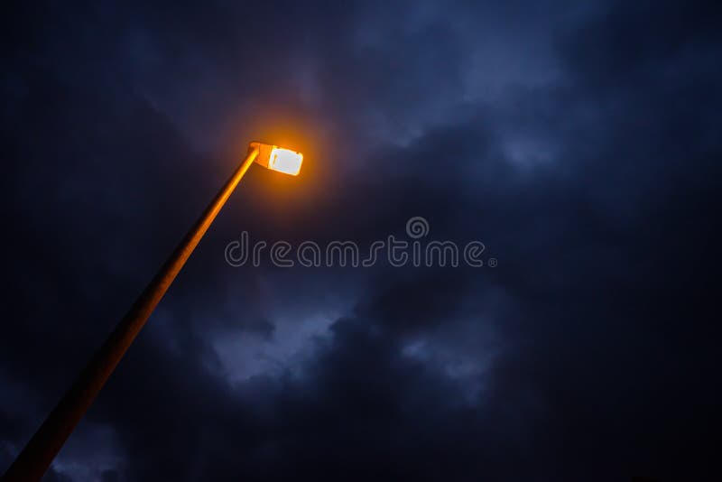 Yellow Light of Street Lamp with Cloudy Sky Stock Photo - Image of dusk ...