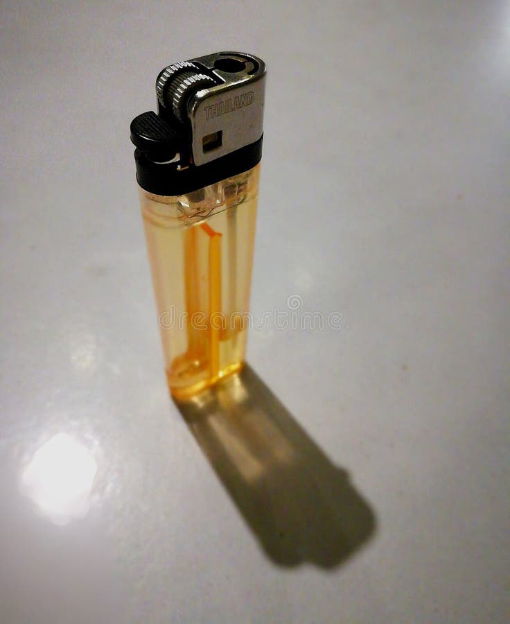 Yellow lighter stock image. Image of accessory, steel - 30018317