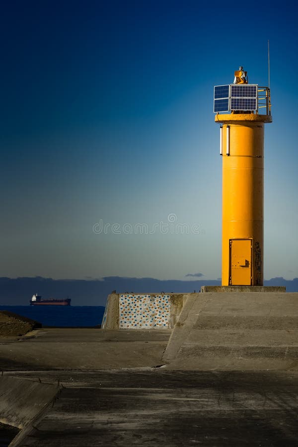 Yellow lighthouse stock photo. Image of seascape, outdoors - 88608152