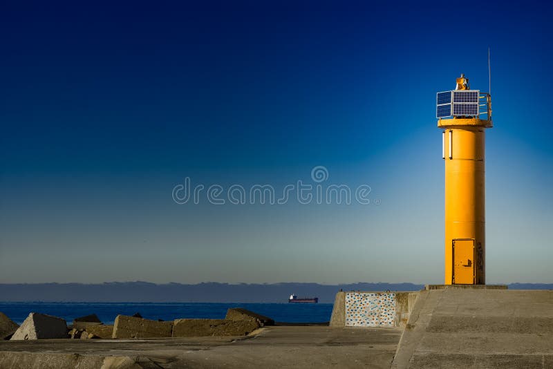 Yellow lighthouse stock photo. Image of seawall, view - 88608640