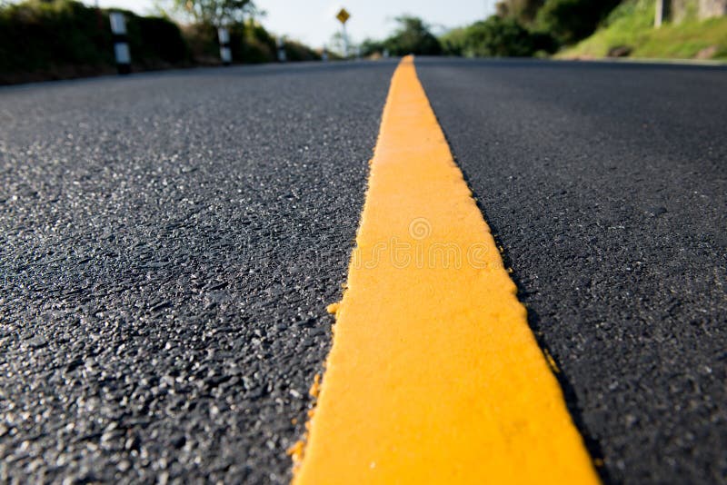 Yellow line on the road stock photo. Image of horizon - 95175474