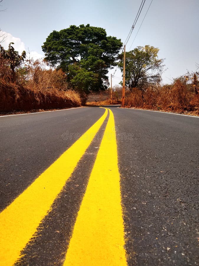 Double Yellow Line on a New Asphalted Road. Stock Image - Image of ...