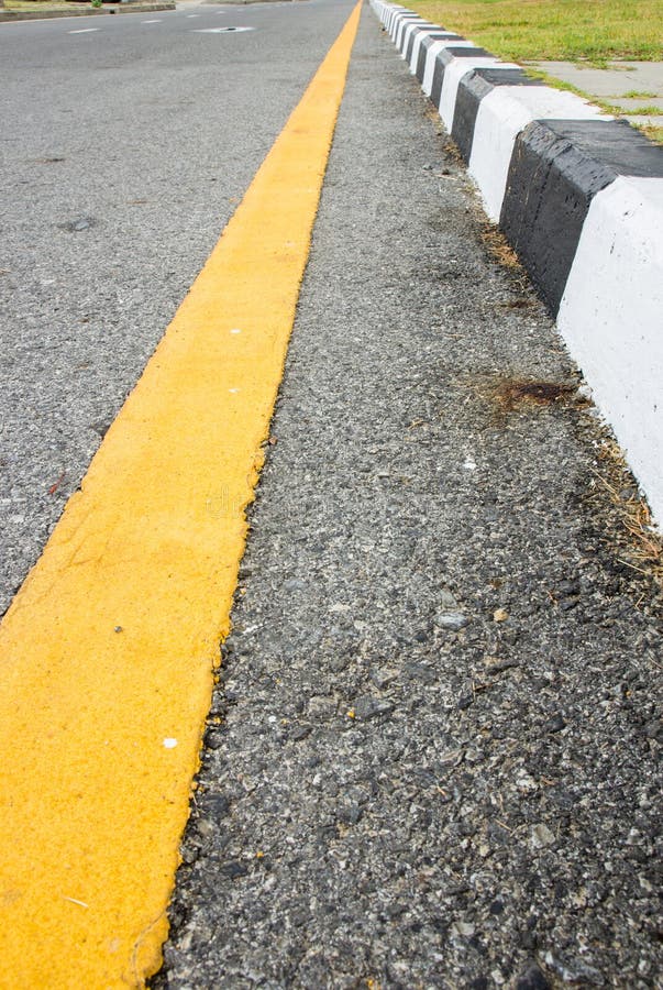 Yellow Line on Street and Footpath Stock Image - Image of footpath ...