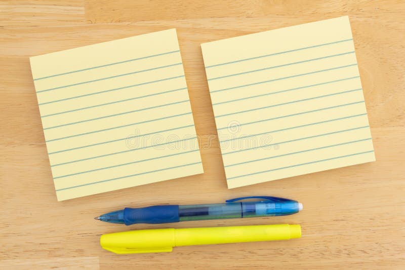 Yellow Lined Sticky Notes with Pen and Highlighter Stock Photo - Image ...