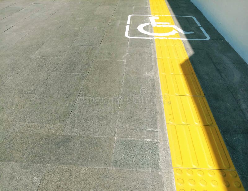Yellow Lines for People with Disabilities Stock Image - Image of people ...
