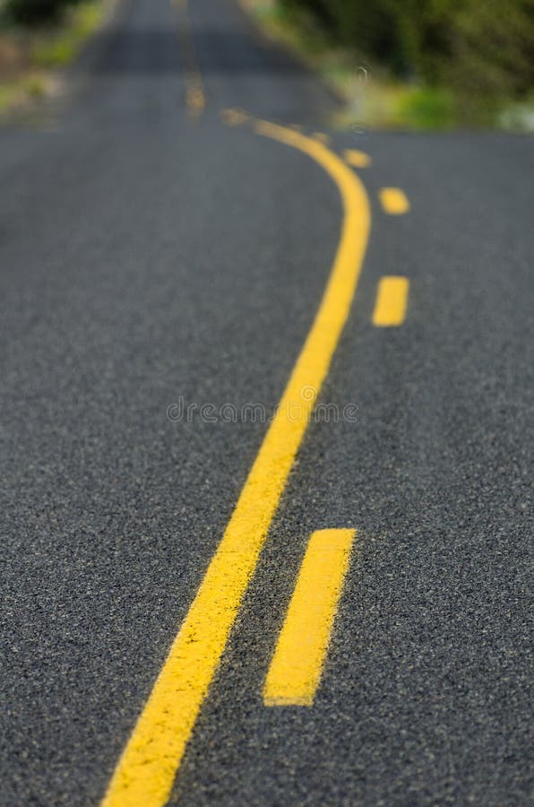 Yellow Lines on Rural Roadway Stock Image - Image of landscape, fading ...