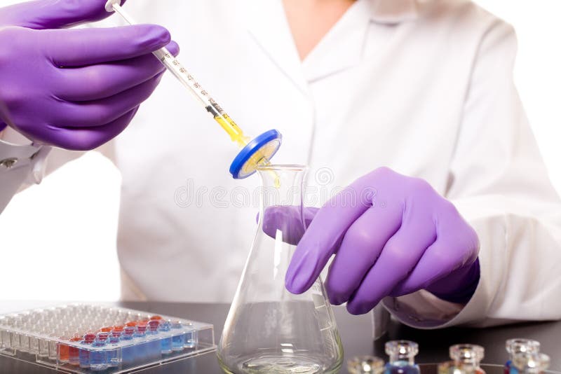 Yellow Liquid Filtered from Syringe through Filter Stock Photo - Image ...