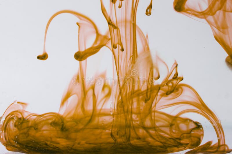 Yellow liquid in water stock image. Image of growth, magic - 53140229