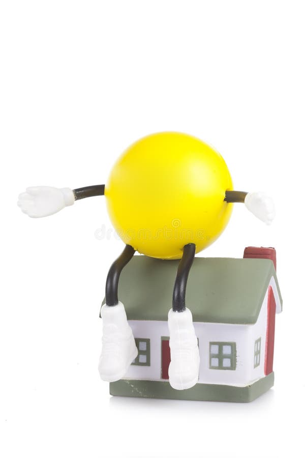 Toy Yellow Little Man Sits on a Chest Stock Image - Image of usurer ...
