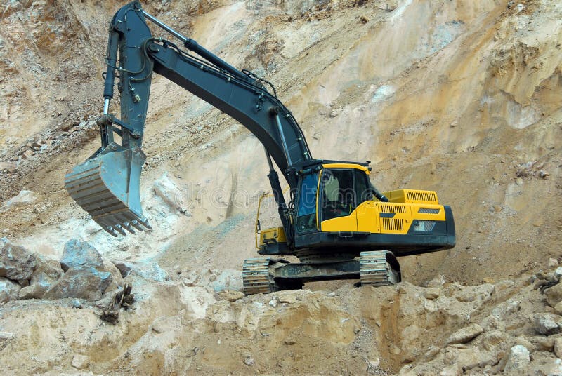 Yellow Loader Backhoe Digs a Trench during Road Construction Works ...