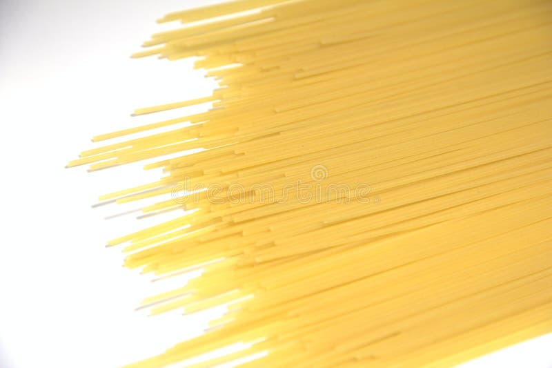 Yellow Long Spaghetti. on a White Background. Stock Photo - Image of ...