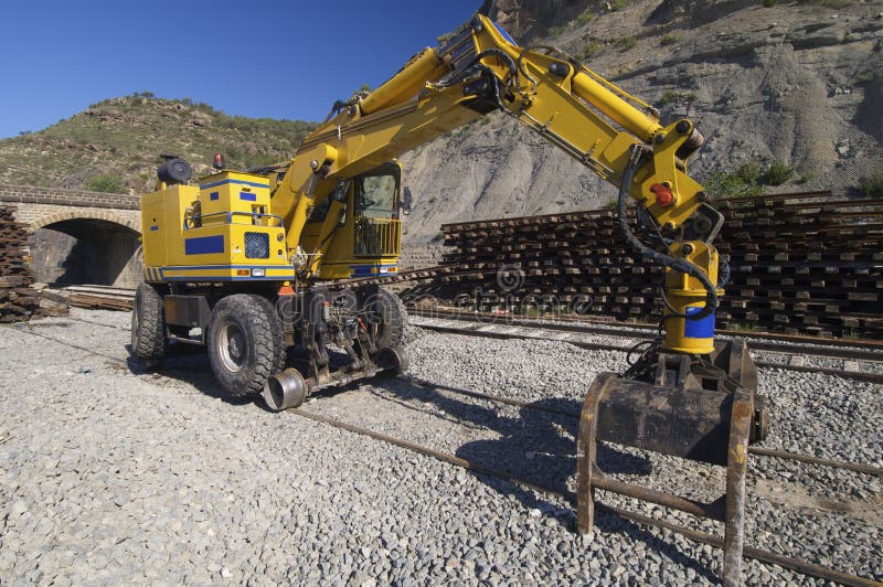 Yellow machine stock photo. Image of track, machine, metalic - 12569712