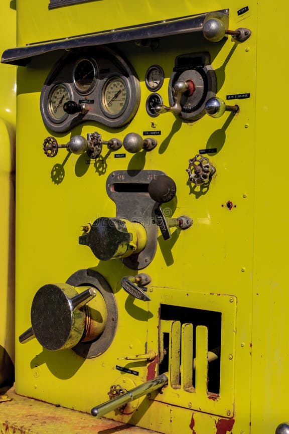 A Yellow Machine with a Lot of Knobs and Dials Stock Photo - Image of ...