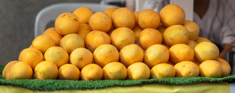 Yellow Mango on a Counter in a Market Stock Image - Image of juicy ...