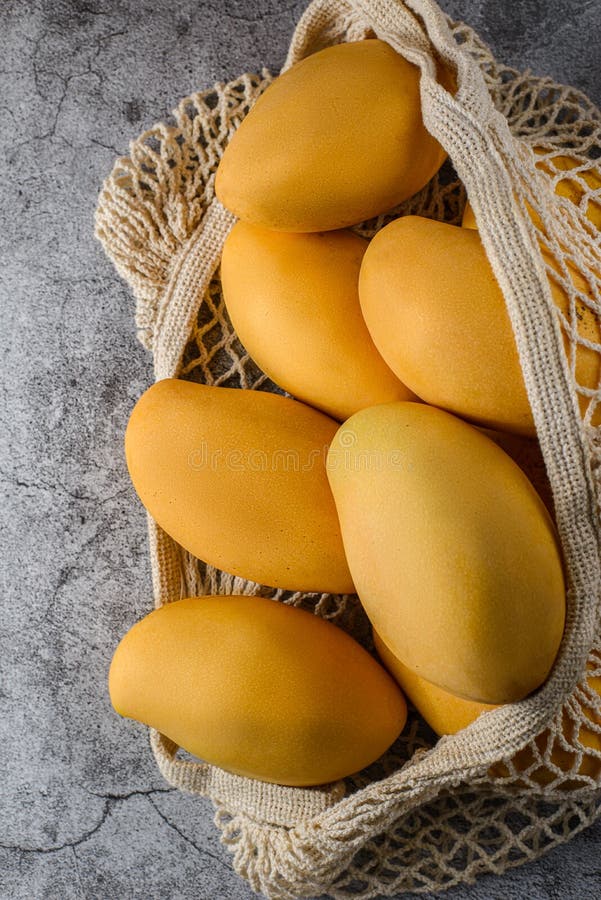 Yellow Mango on a Gray Background Stock Photo - Image of cube, cold ...