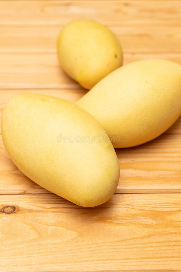 Yellow Mangoes on the Table in a Cut Form Stock Image - Image of nature ...