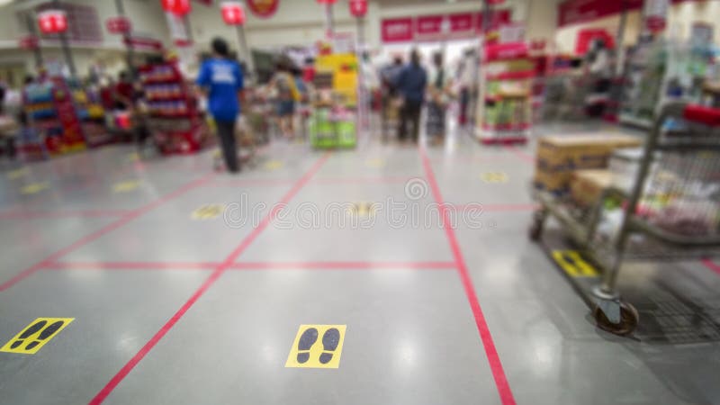 Yellow Marker Strips of a Shopping Centre, Showing Customers in the ...