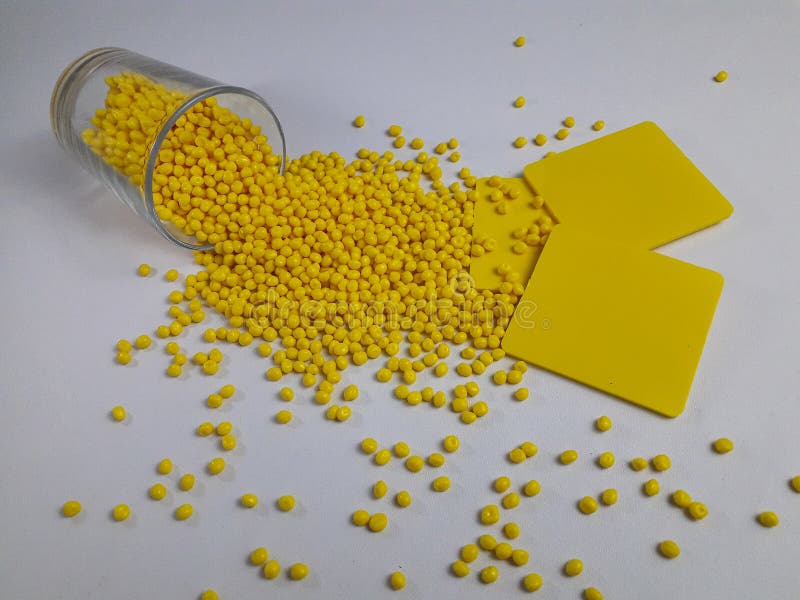 Yellow masterbatch granule stock photo. Image of masterbatch - 320713660