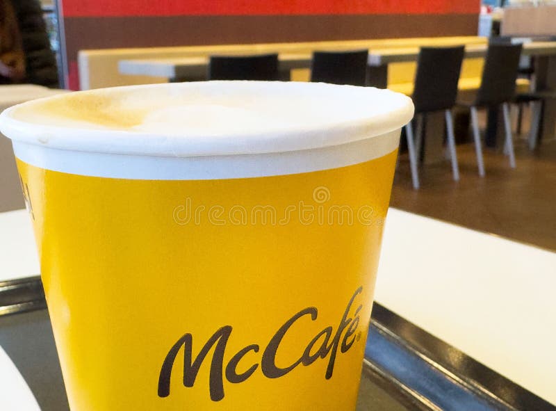Yellow Mccafe Coffee Cup on Table Inside Fast Food Editorial Image ...