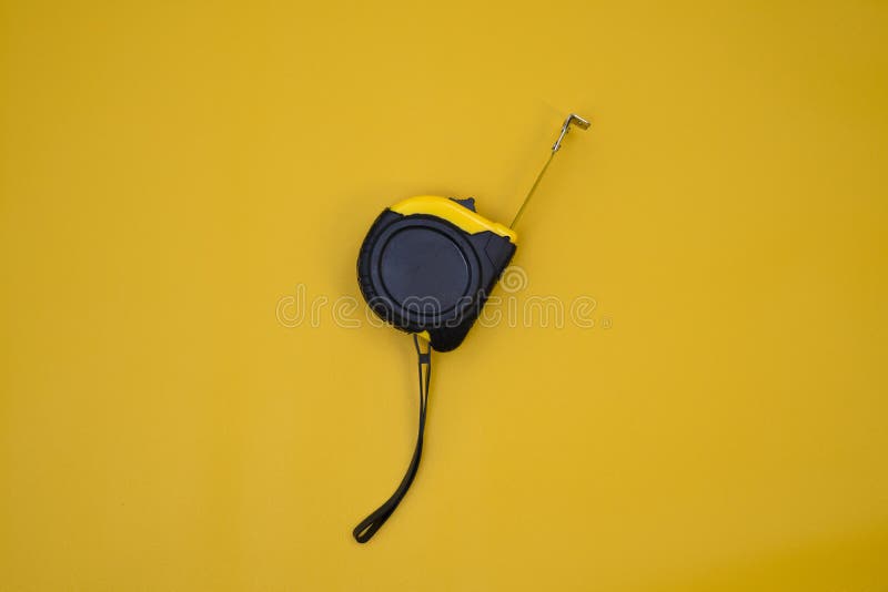 A Yardstick Isolated on Yellow Stock Photo - Image of orange, clipping ...