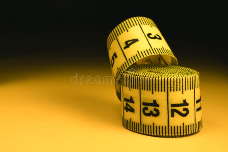 Yellow Measuring Tape on Color Background. a Measuring Tape on Yellow ...