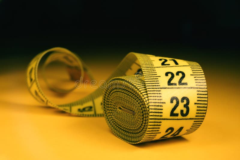 Yellow Measuring Tape on Color Background. a Measuring Tape on Yellow ...