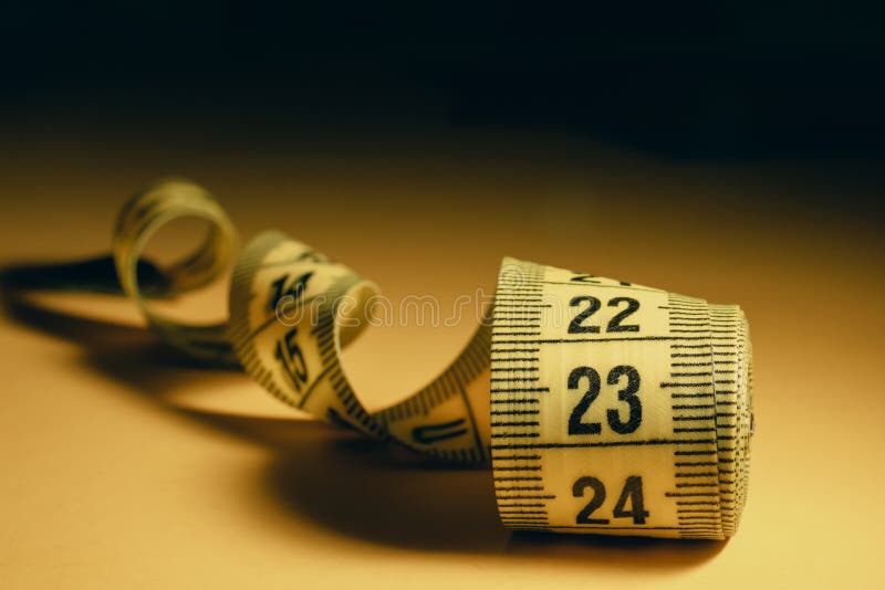 Yellow Measuring Tape on Color Background. a Measuring Tape on Yellow ...