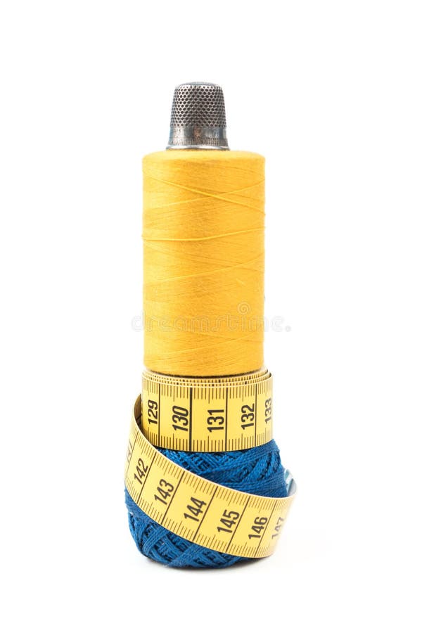 Yellow Measuring Tape on Top of Blue Sewing Thread with Silver Thimble ...