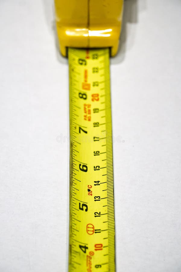 Yellow Measuring Tape on a White Background Stock Image - Image of ...
