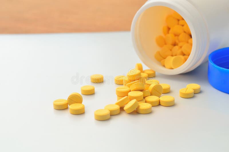 Yellow Tablet And Medicine Yellow Bottle Stock Image - Image of health ...
