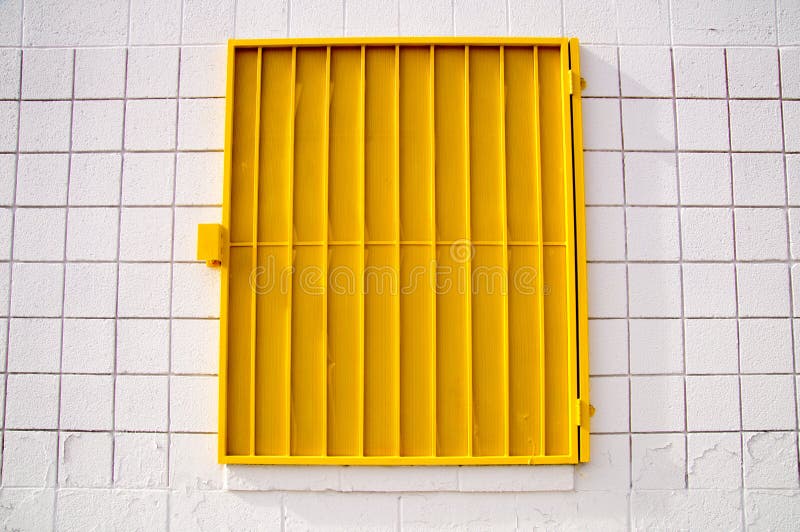 Yellow Mesh Shutter on White Wall Stock Photo - Image of window ...