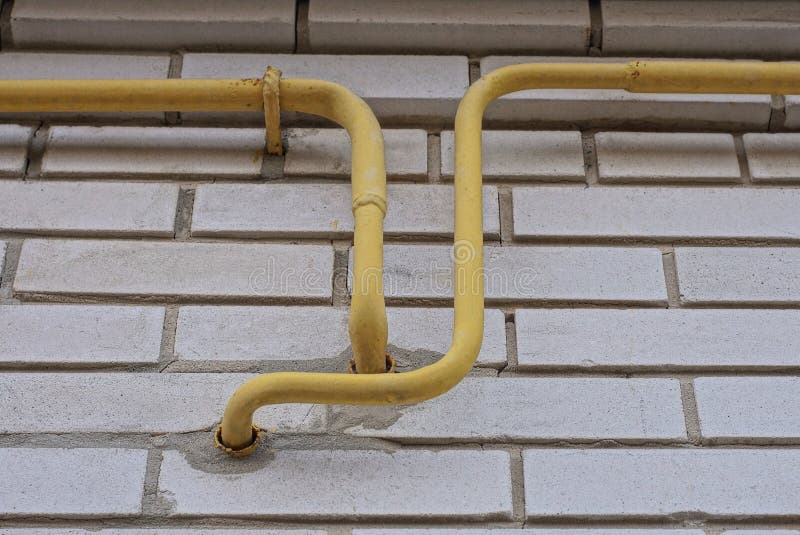 Metal Gas Pipes on a White Brick Wall Stock Image - Image of building ...