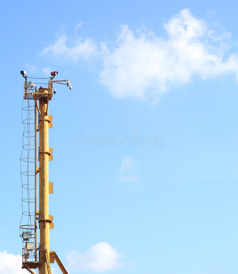 Yellow Metal Observation Tower Against a Cloudy Sky Stock Photo - Image ...