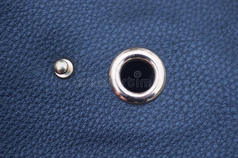Yellow Metal Ring and Iron Rivet Button in Black Leather Stock Image ...