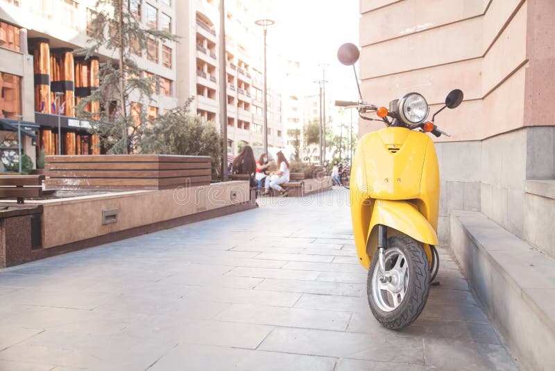 Yellow Modern Moped in a City Stock Photo - Image of city, moped: 193263186