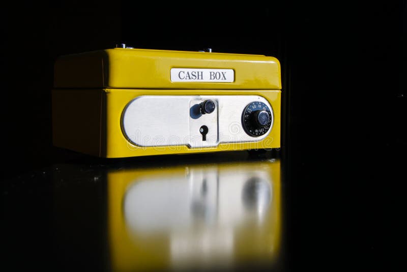 Yellow Money Box with Numeric Combination Stock Photo - Image of black ...